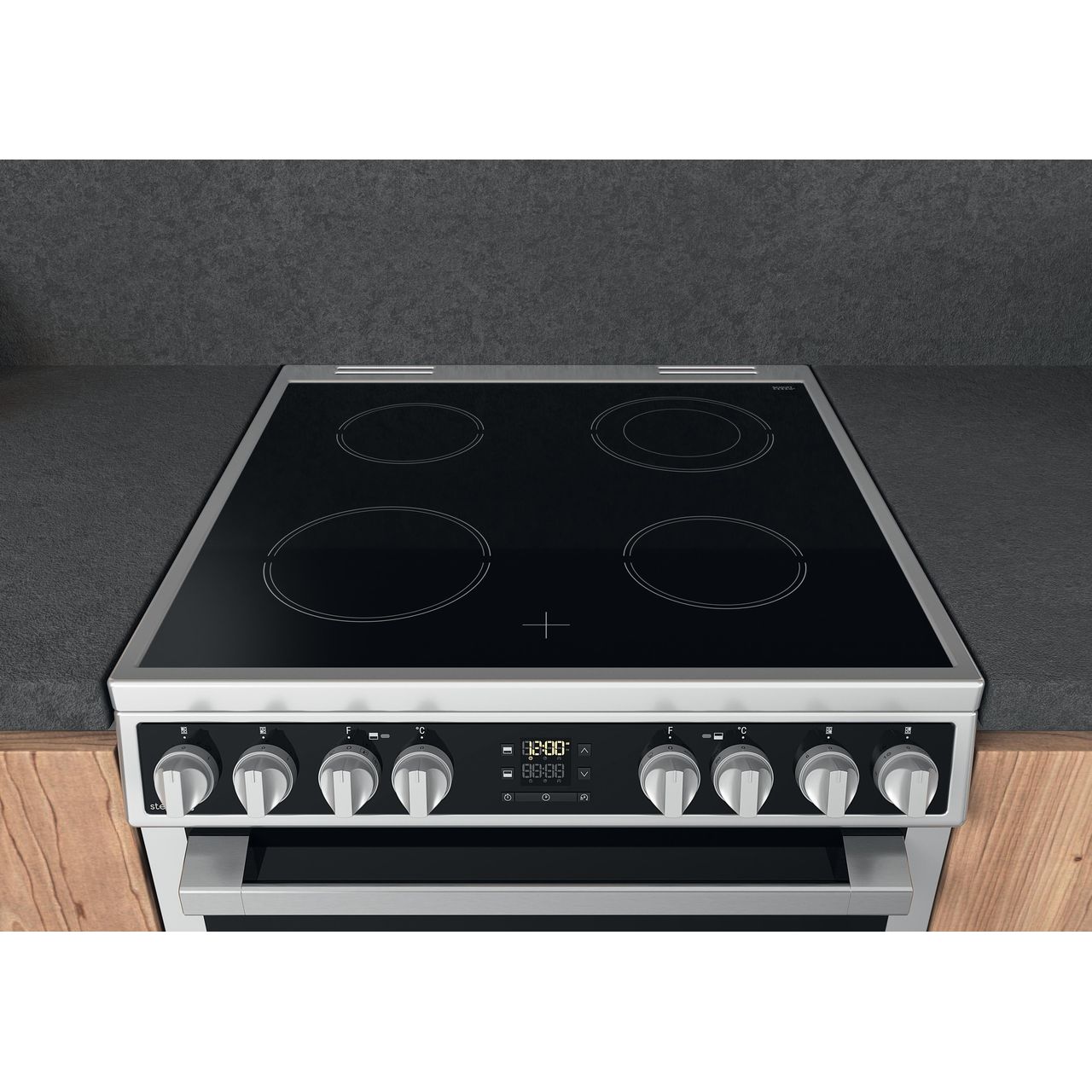 Hotpoint electric cooker with ceramic hob HDM67V8D2CX UK BK ao